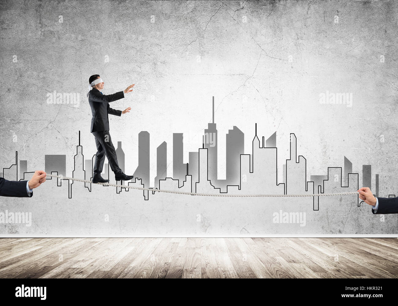 Business concept of risk support and assistance with man balancing on ...