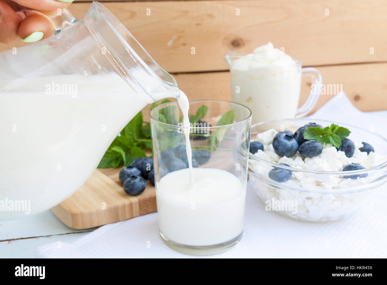 Fresh milk pouring bowl full hi-res stock photography and images - Alamy