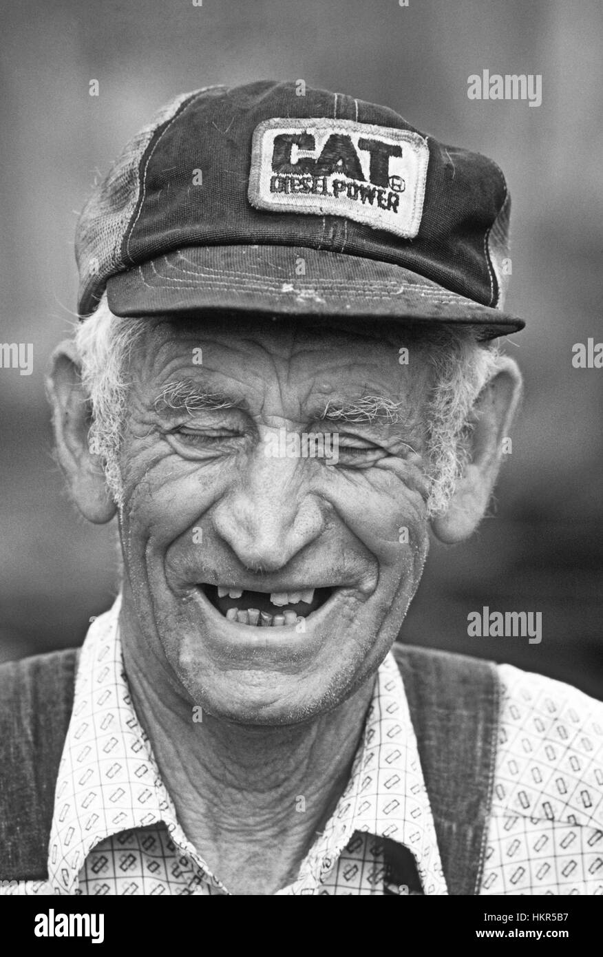 A farmer with few teeth on his remote farm in a "holler" high in the ...