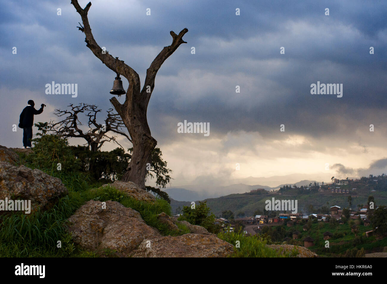 Lalibela, Amhara region, Ethiopia. A man photographing from a hillside ...