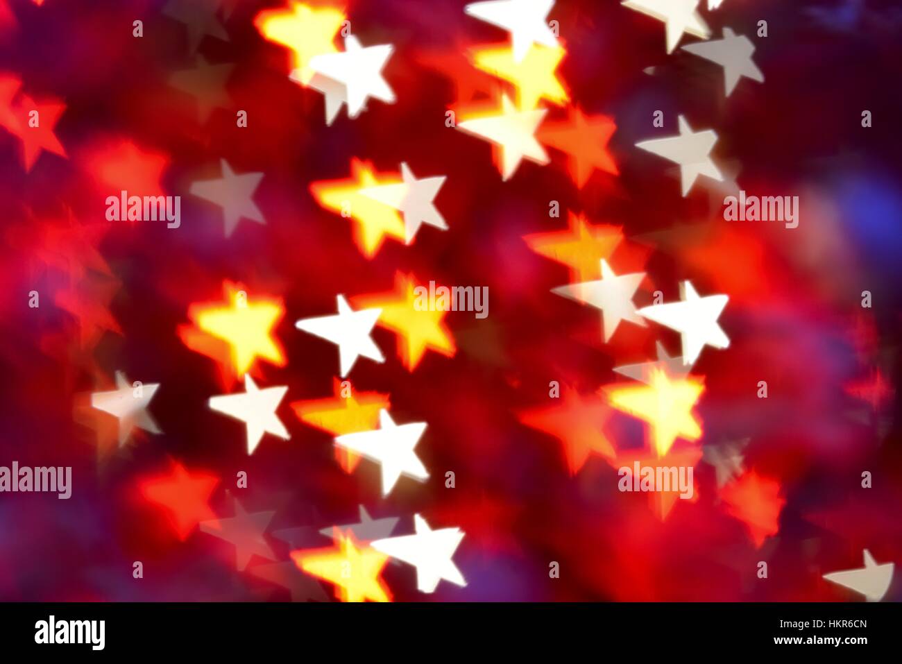 Abstract star patterns against dark background Stock Photo - Alamy