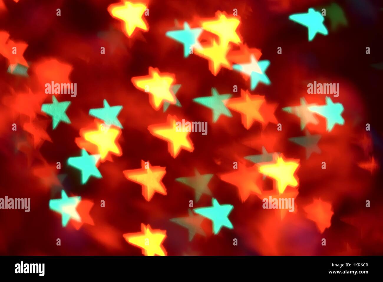 Abstract star patterns against dark background Stock Photo - Alamy