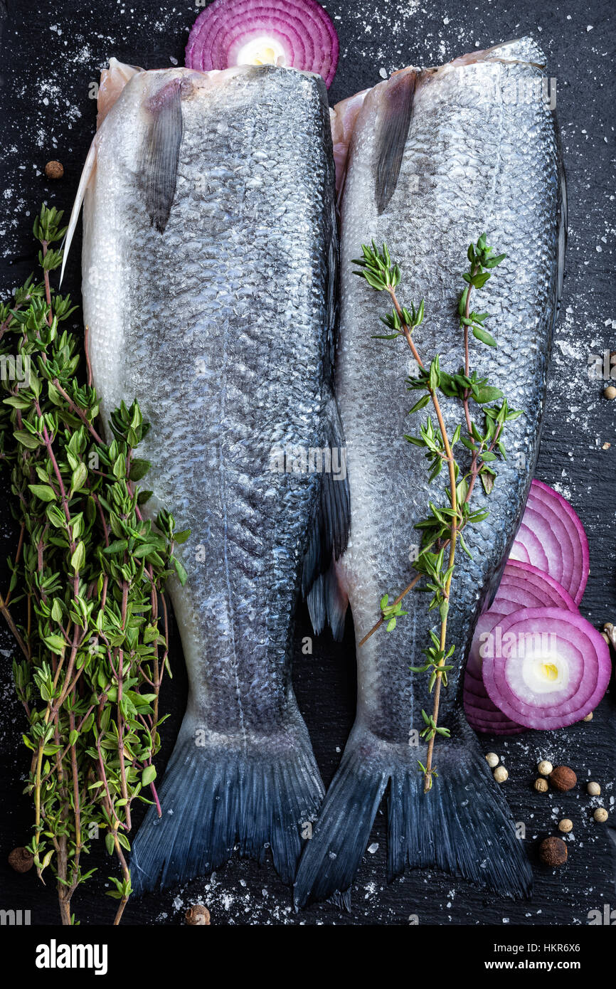 raw sea bass fish Stock Photo - Alamy