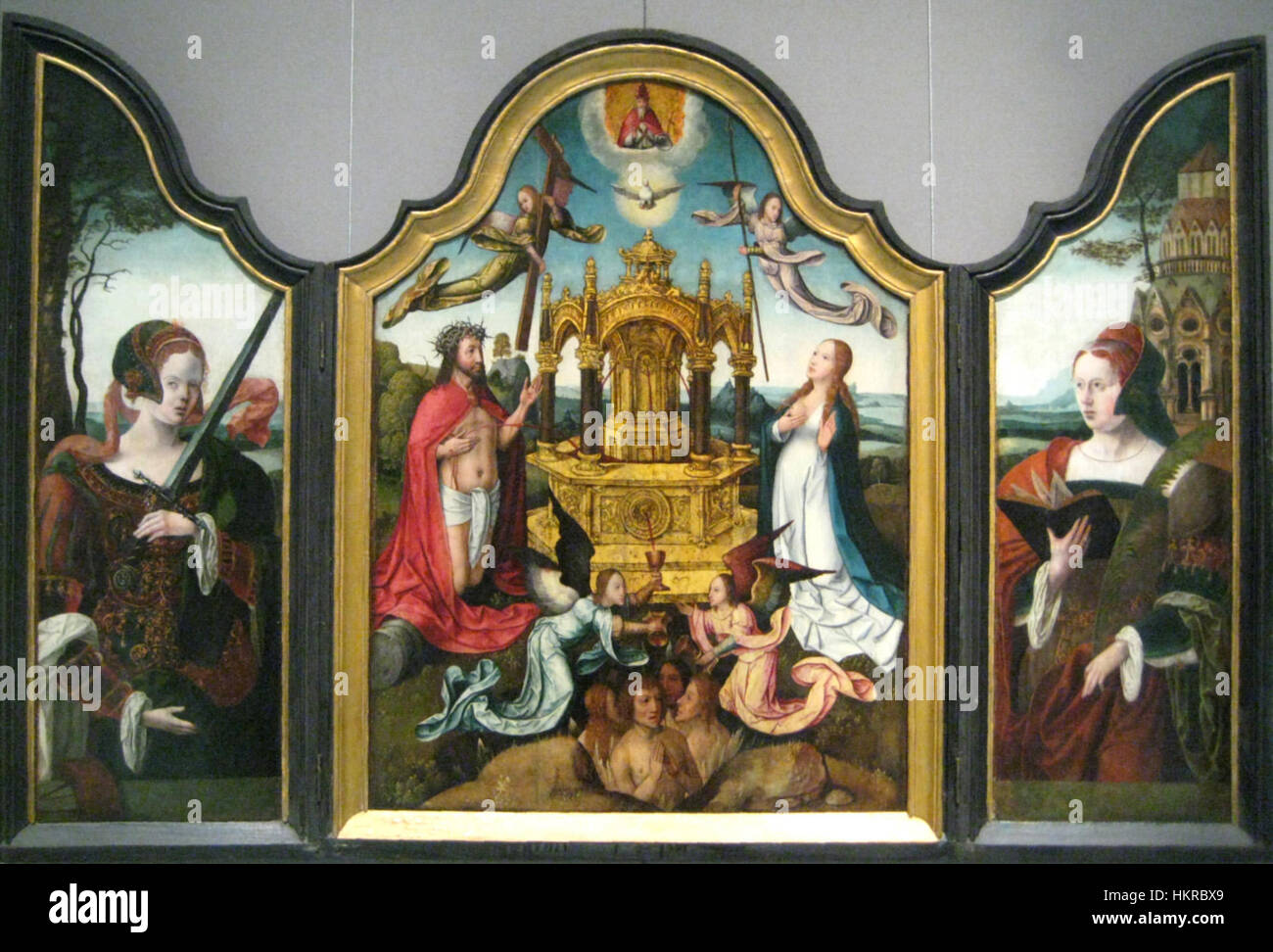 This triptych, attributed to Jean Bellegambe and his workshop, portrays the *Blood of Christ ...