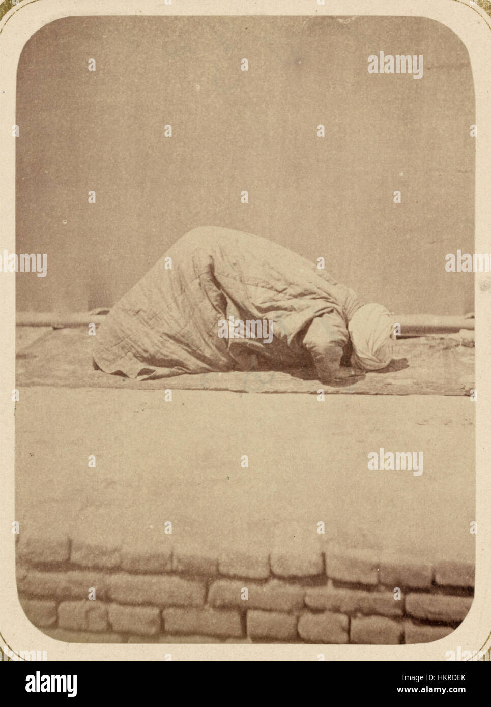 This artwork depicts the various stages of Muslim prayer, with a focus ...