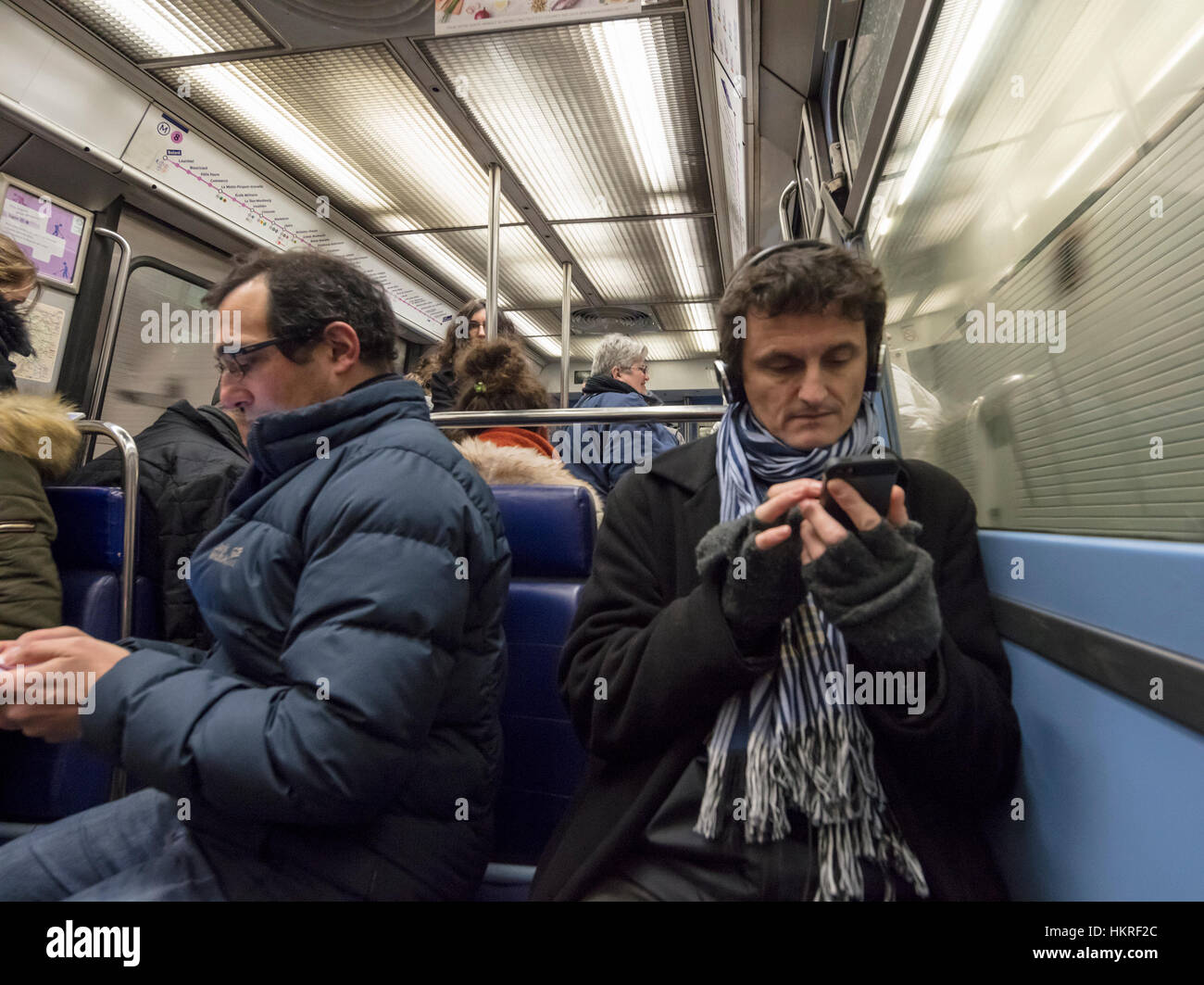 Game on phone subway hi-res stock photography and images - Alamy