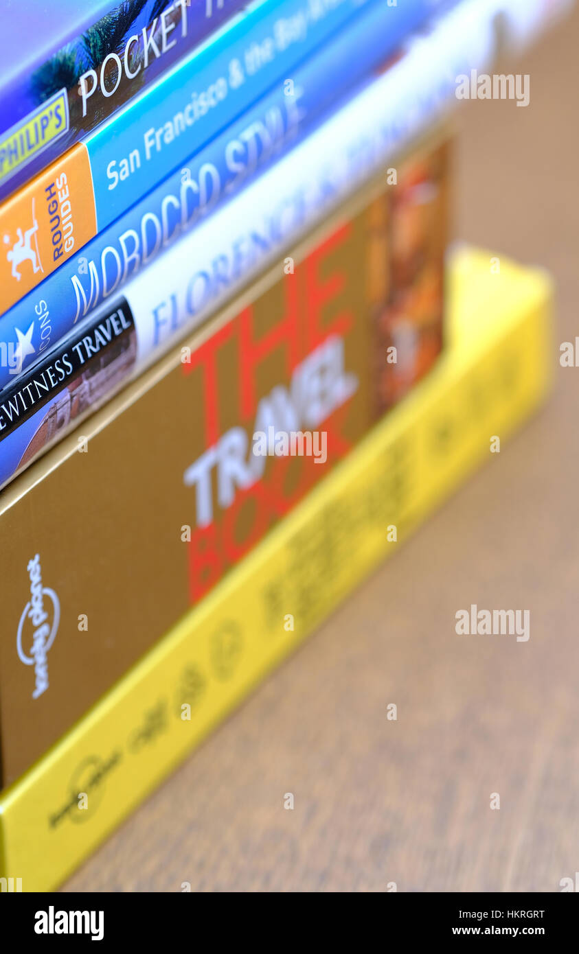 Travel Guide Books on a table top Stock Photo - Alamy