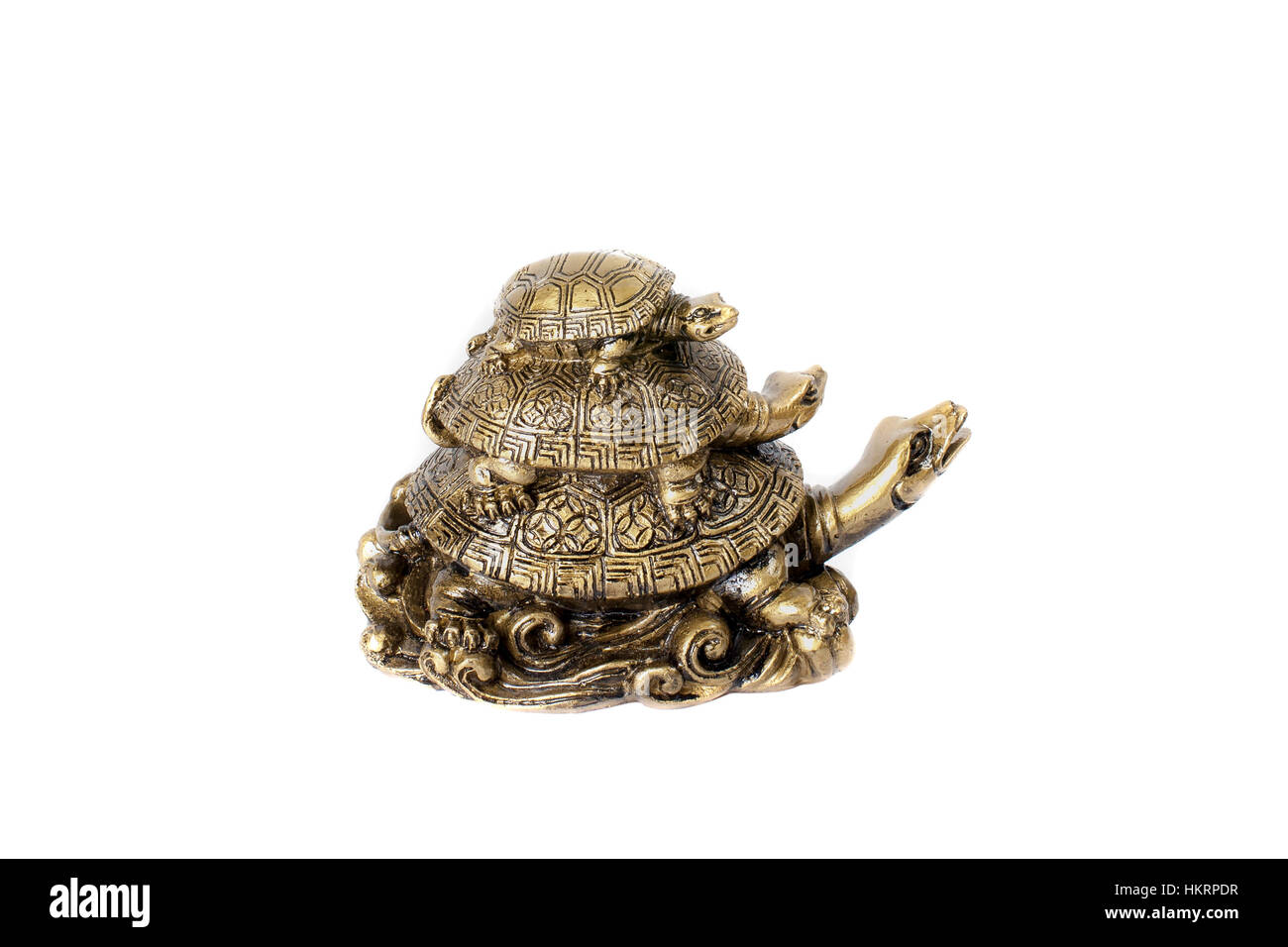 Bronze turtles isolated on white background Stock Photo - Alamy