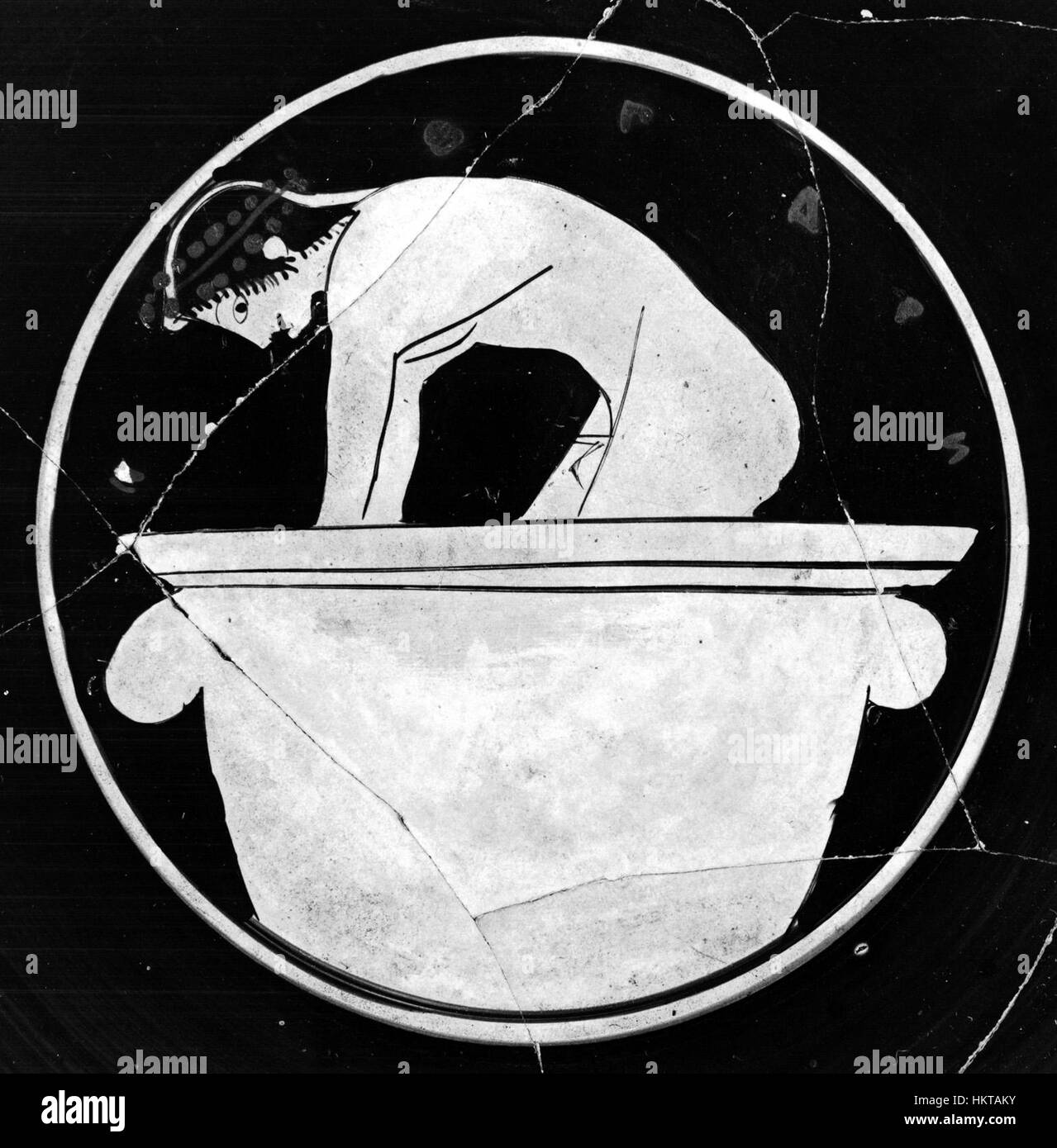 This ancient Greek kylix, attributed to the Epeleios Painter, depicts a ...