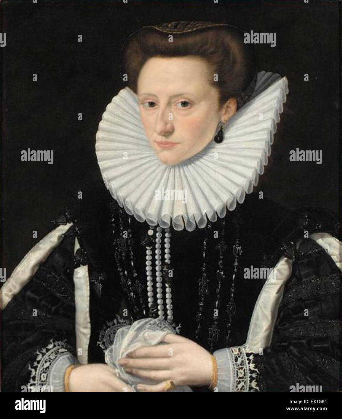 This painting, attributed to a follower of Frans Pourbus the Younger, features a lady dressed in ...