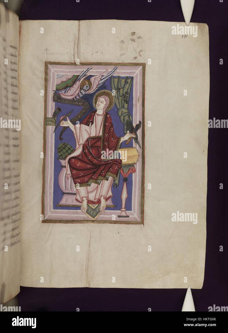 This artwork is an illuminated manuscript page from the Latin Gospels ...