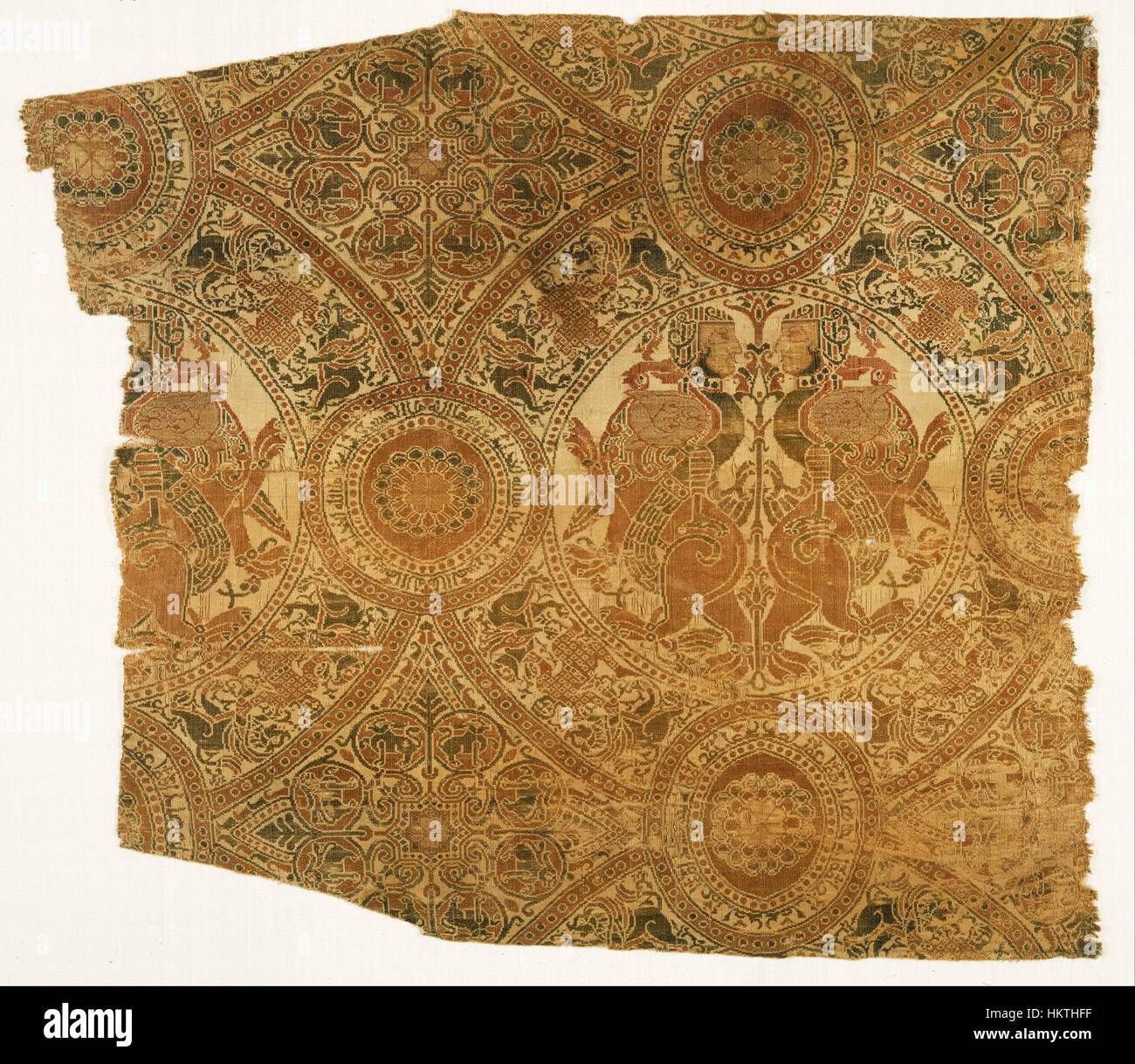 This artwork features a fragment depicting wrestling lions and harpies ...