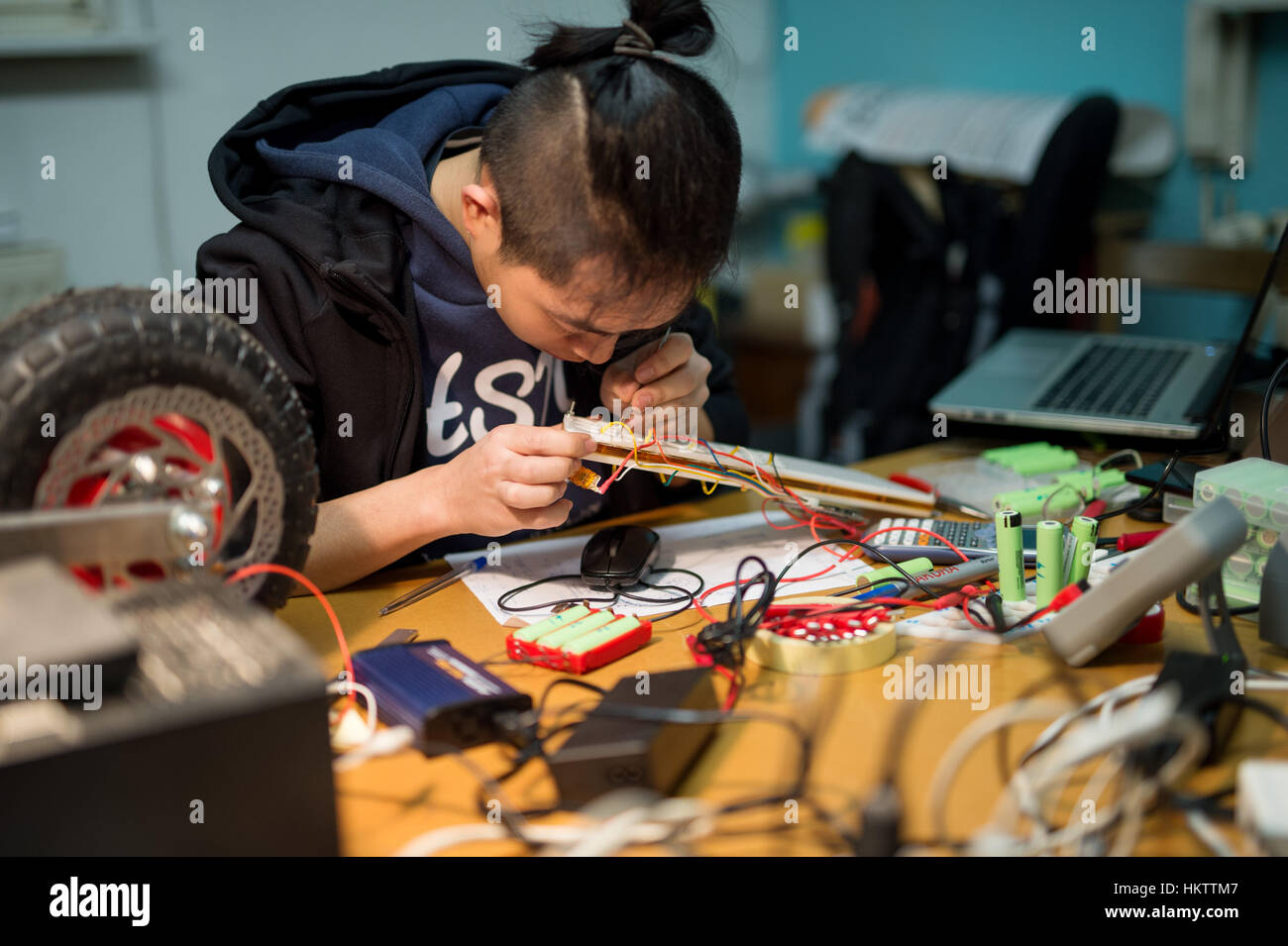 Hamburg, Germany. 12th Jan, 2017. Lo-Chen Cheng works at the Fab Lab in ...