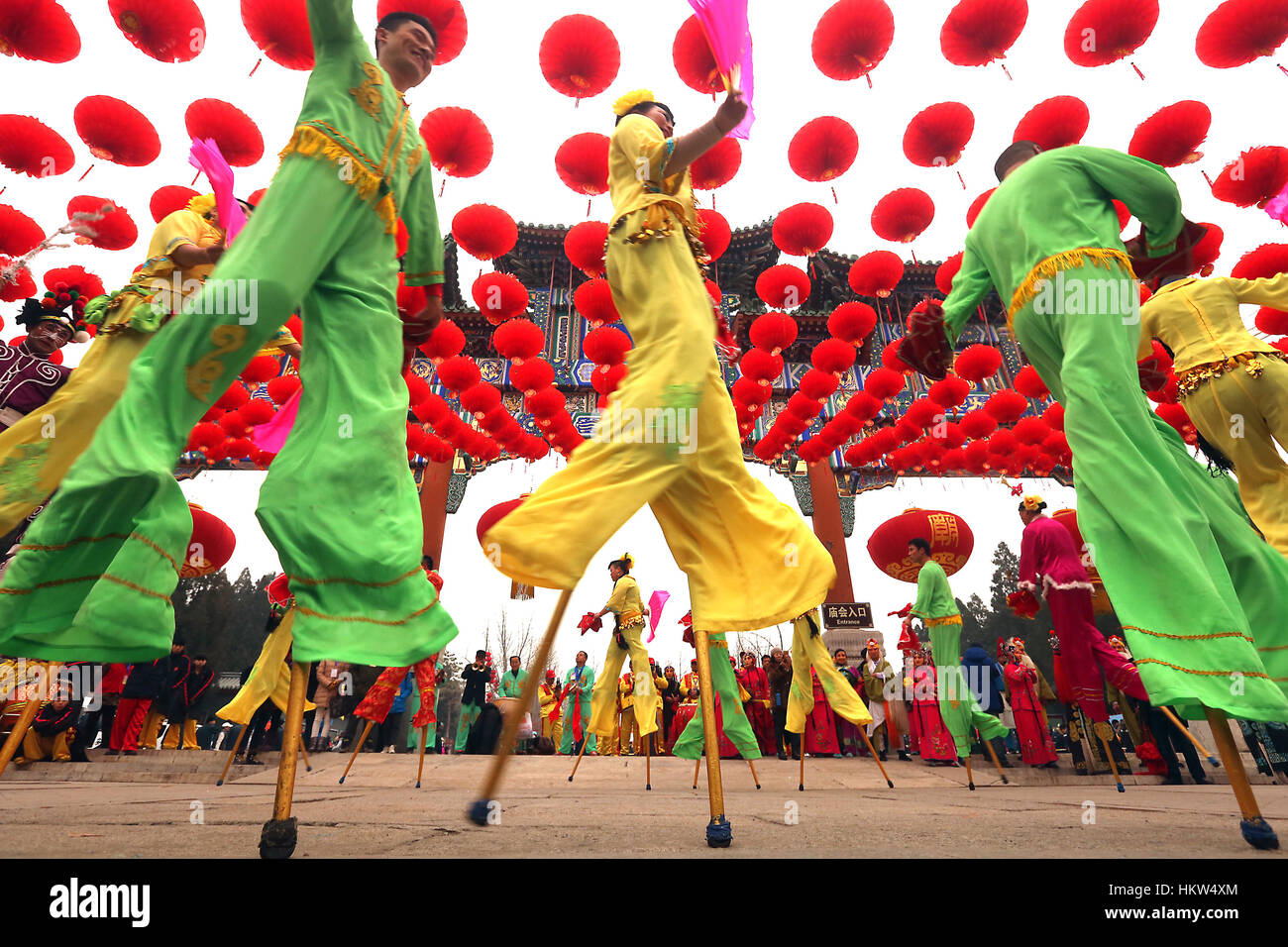 Beijing, CHINA, China. 23rd Dec, 2012. Chinese on stilts perform during ...