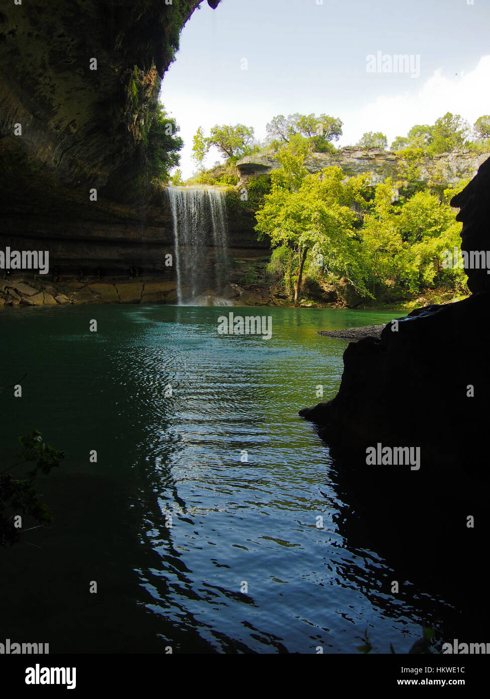 A waterfall at a limestone rock formation at Hamilton Pool Preserve ...