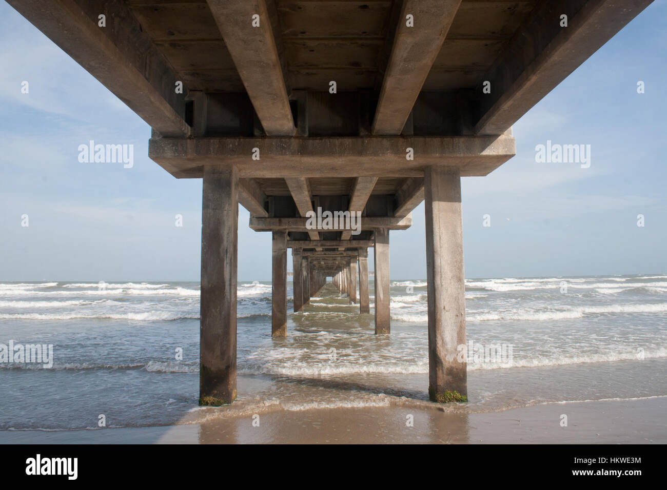 A pier juts into the ocean at the Gulf of Mexico in Texas Stock Photo ...