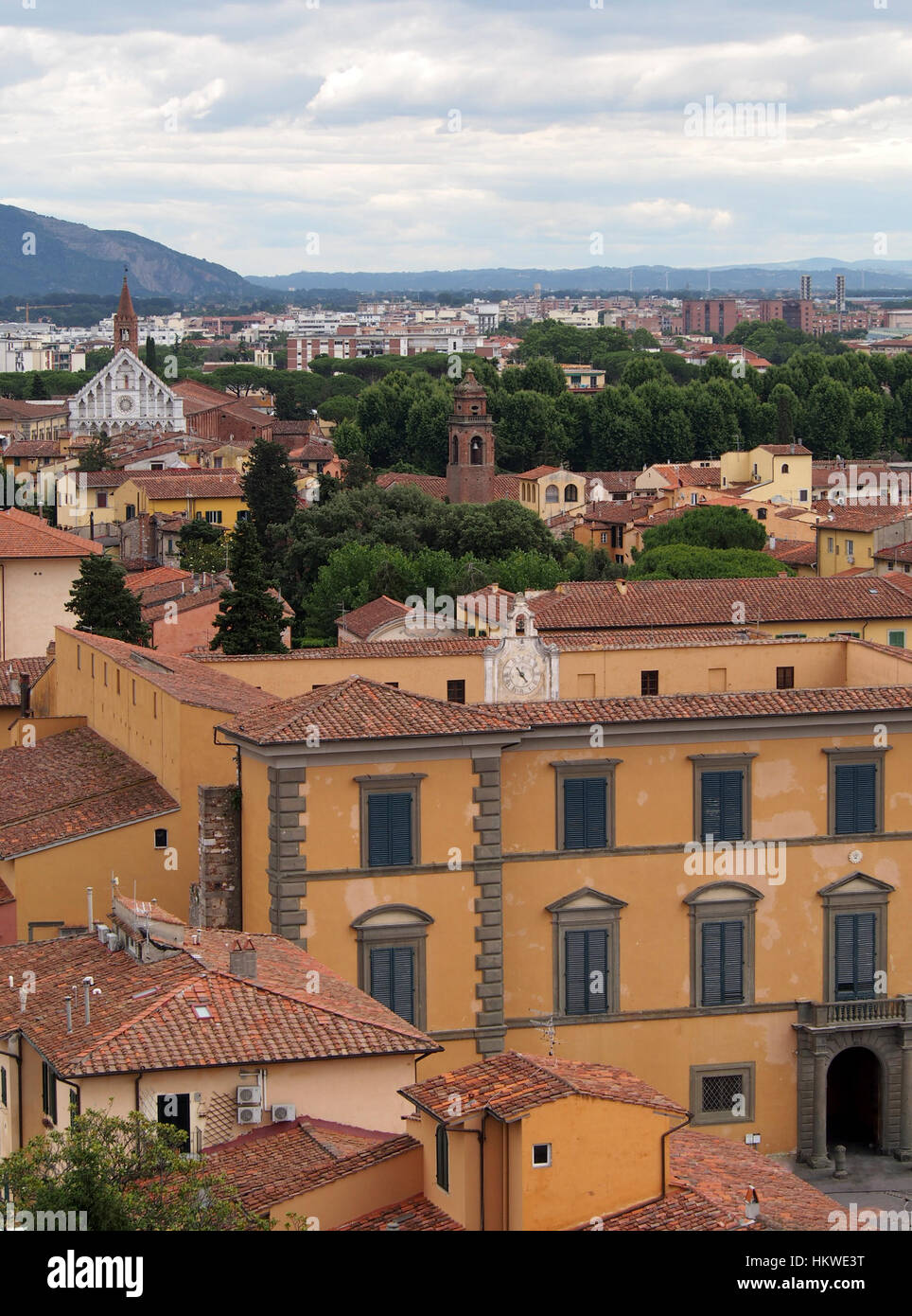 Red shingled rooftops on curving streets of Pisa Italy Stock Photo - Alamy