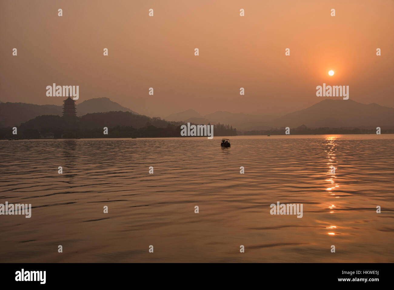 Sunset over West Lake, Hangzhou, China Stock Photo - Alamy