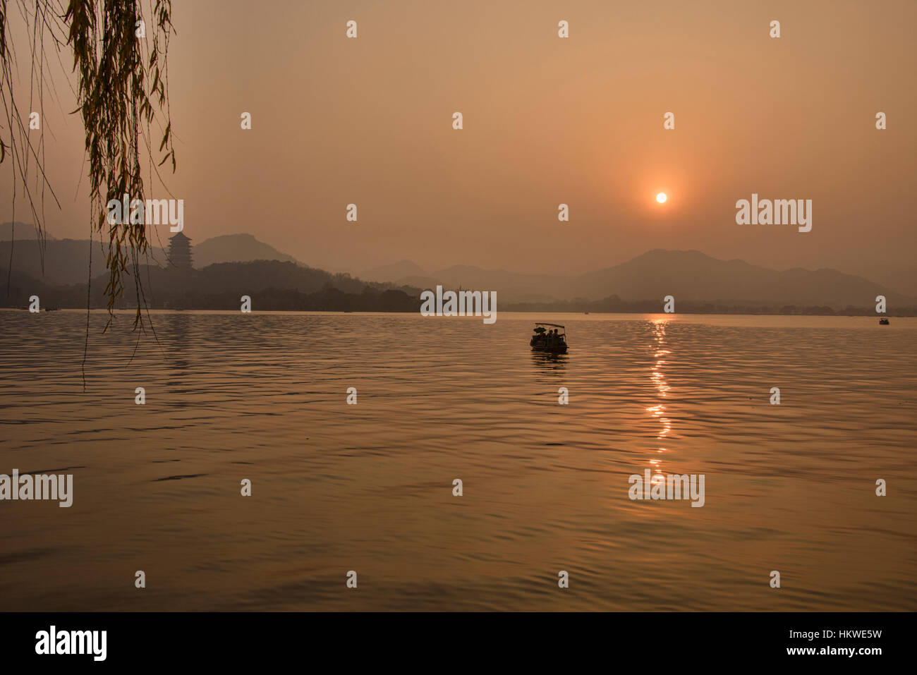 Sunset over West Lake, Hangzhou, China Stock Photo - Alamy