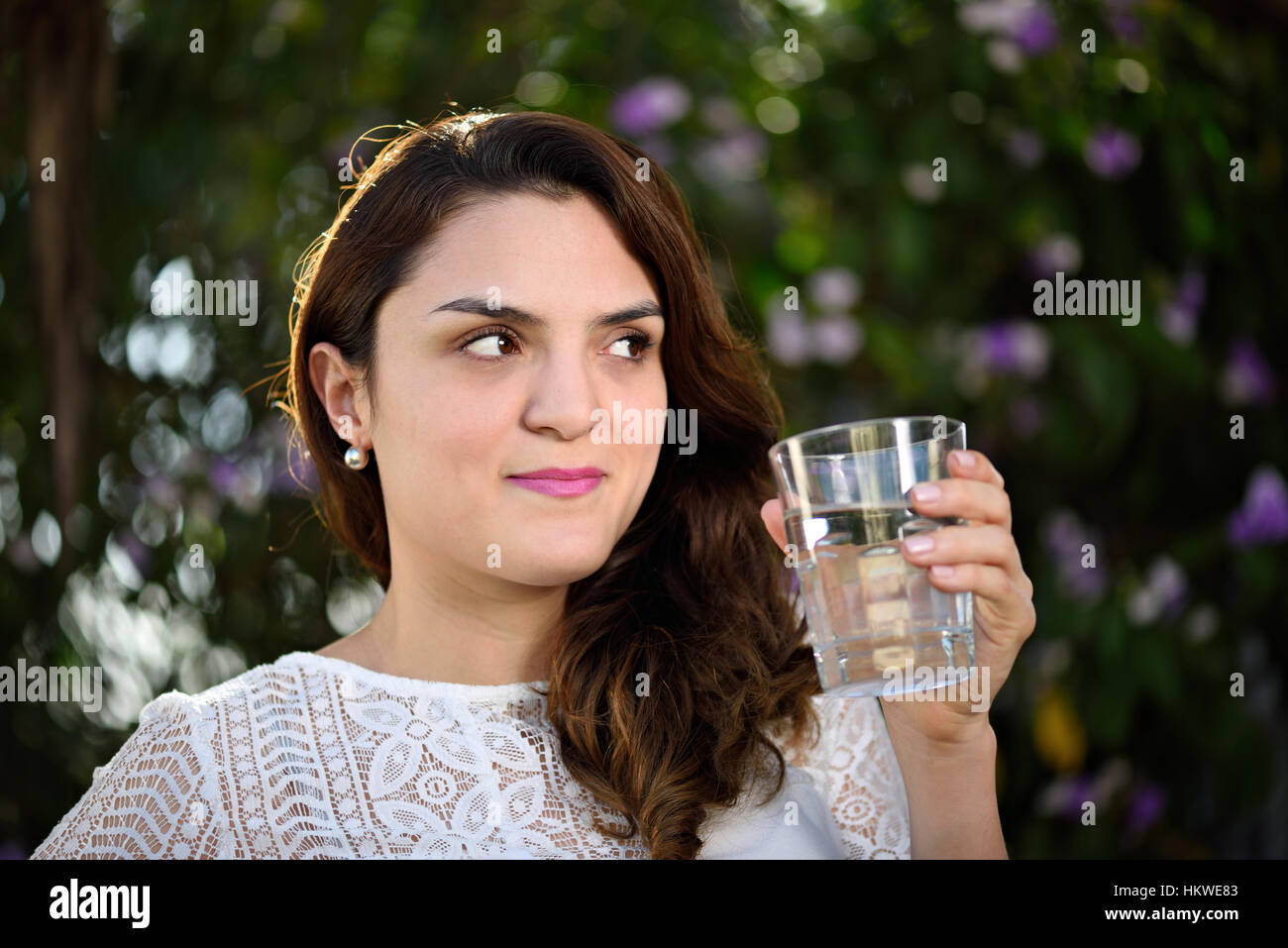 hispanic girl hold glass with water in green park Stock Photo - Alamy hispanic girl hold glass with water in green park Stock Photo - Alamy