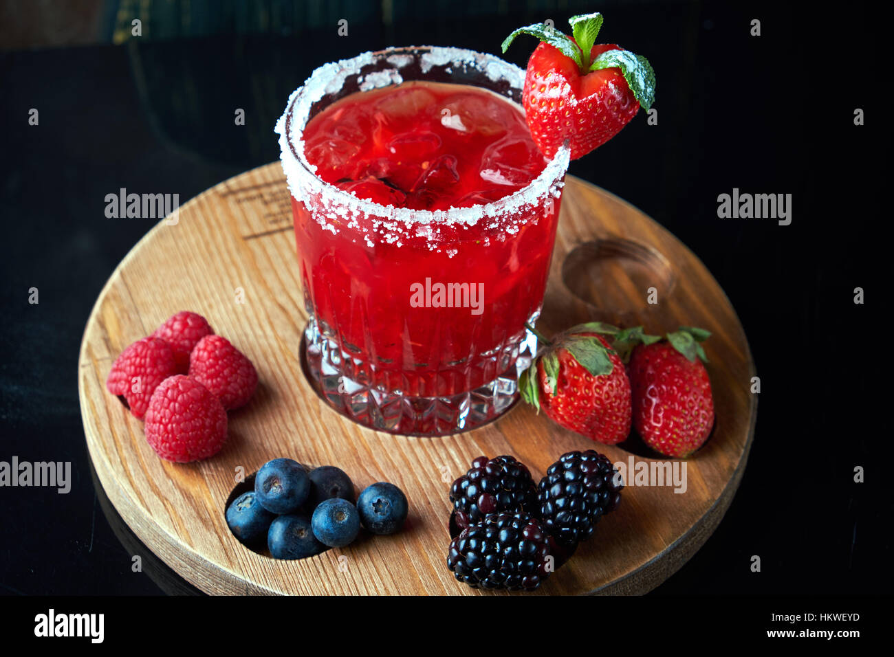 Alcoholic cocktail with berries Stock Photo - Alamy