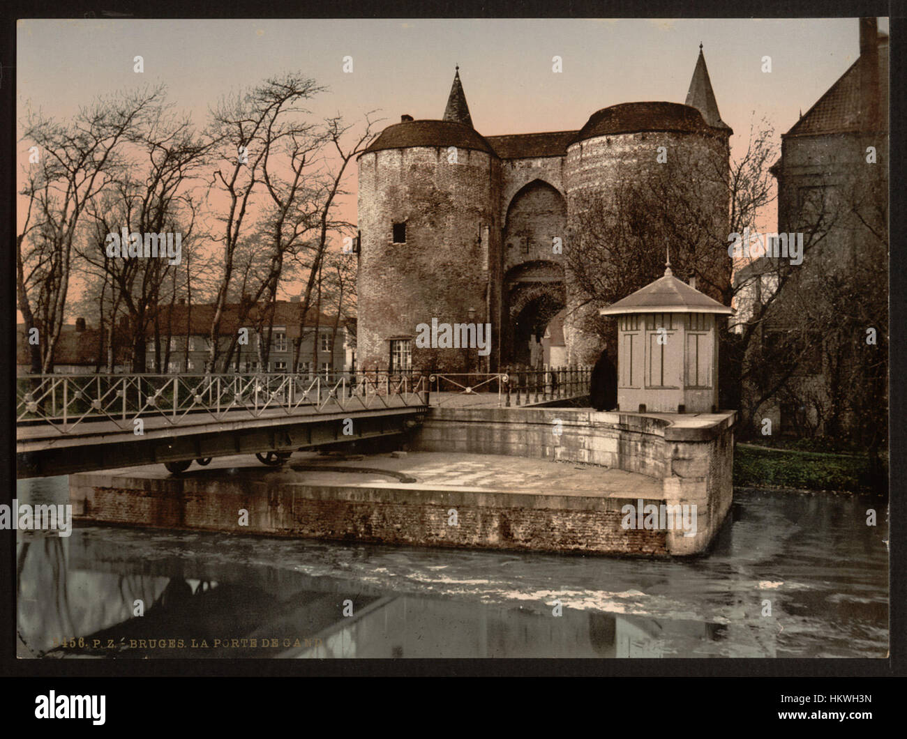 Ghent Gate in Bruges, Belgium, is a medieval city gate that stands as a ...