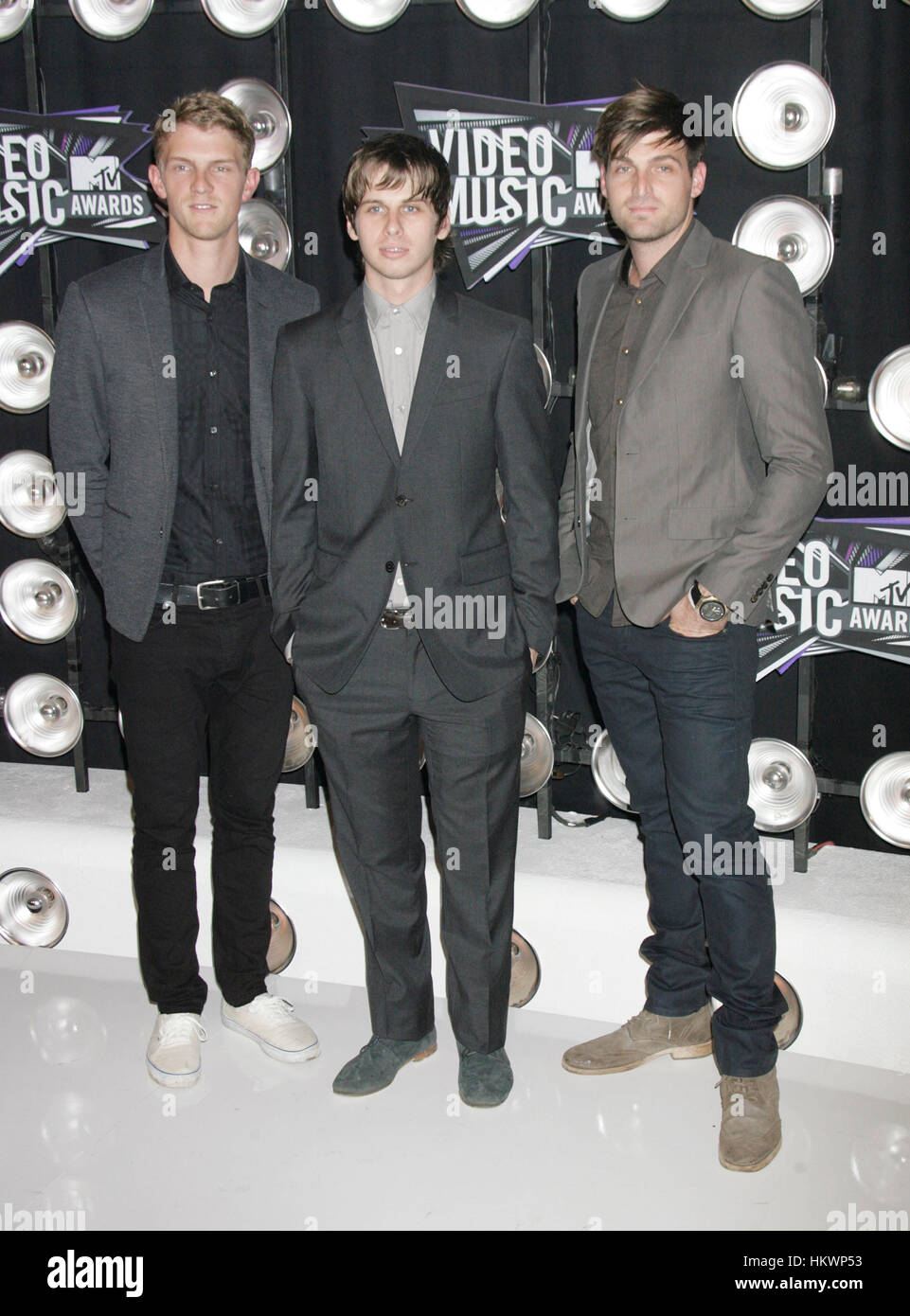 Musicians Mark Pontius, Mark Foster and Cubbie Fink of Foster the ...