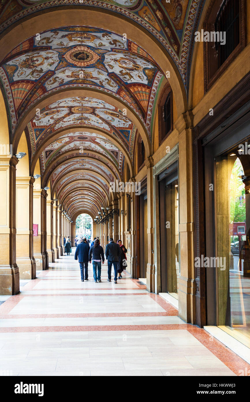BOLOGNA, ITALY - OCTOBER 31, 2012: people in medieval arcade on piazza ...