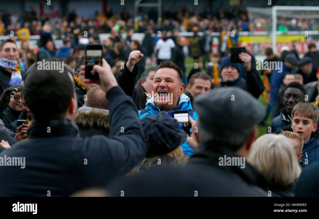 Sutton United Manager Paul Doswell celebrates with fans after winning ...