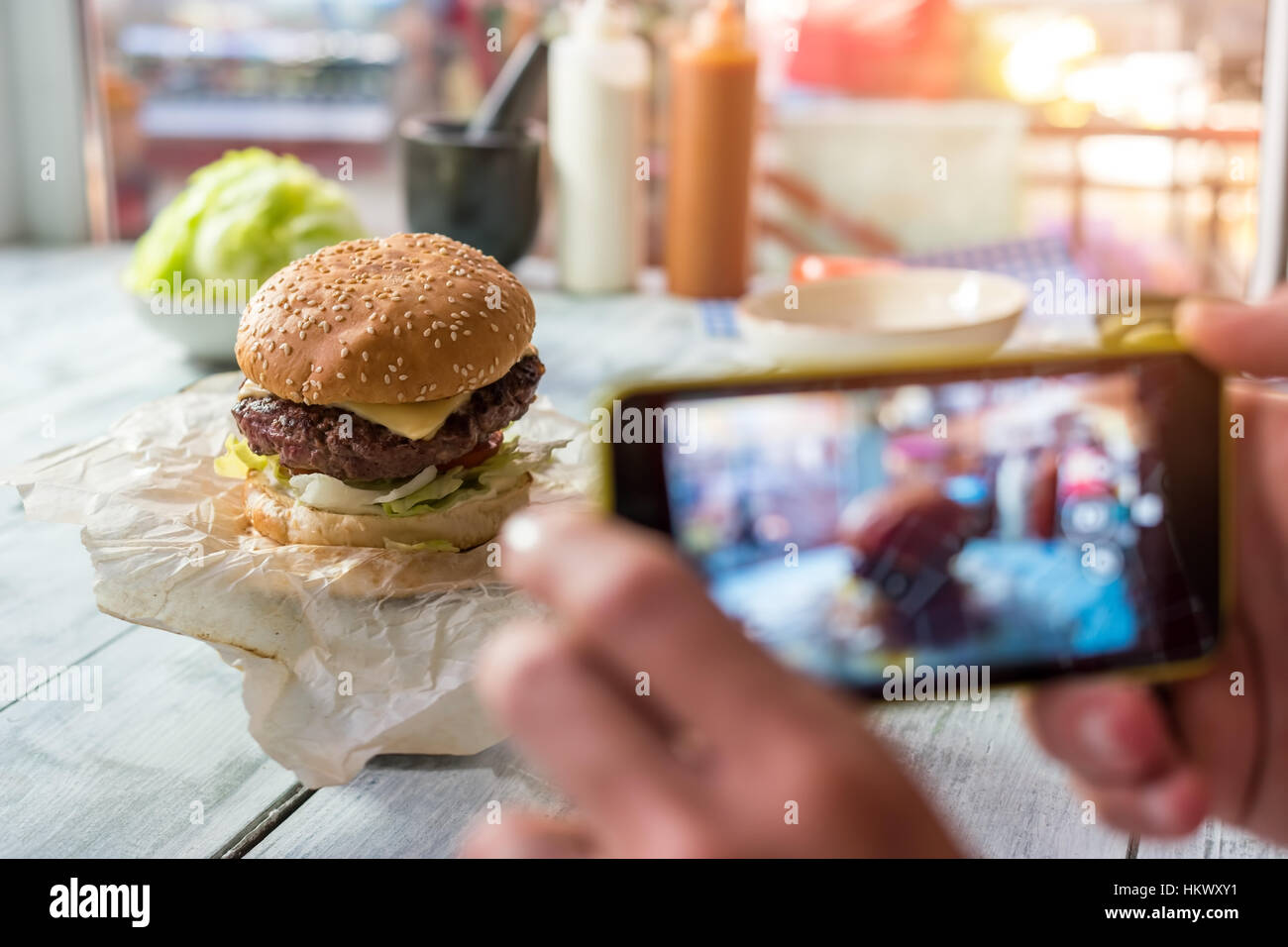 Burger on the table Stock Photo - Alamy
