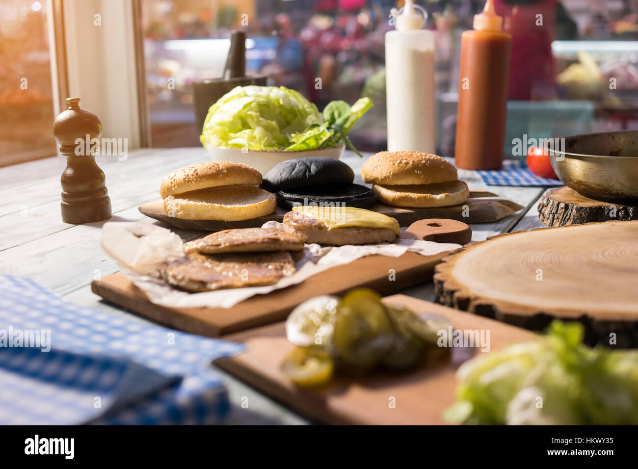 Burger ingredients on the table Stock Photo - Alamy
