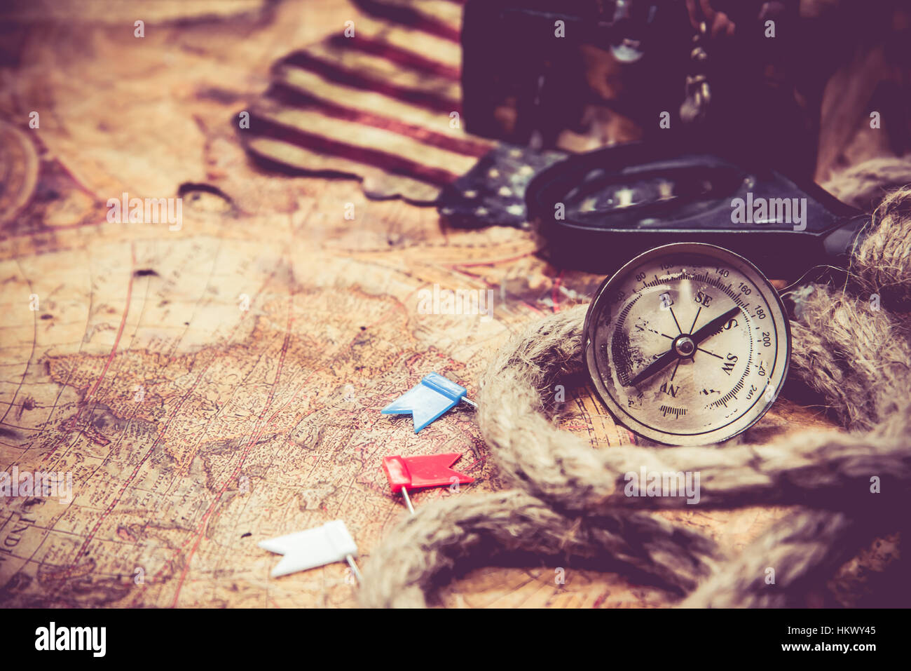 Columbus day and world map with compass Stock Photo - Alamy