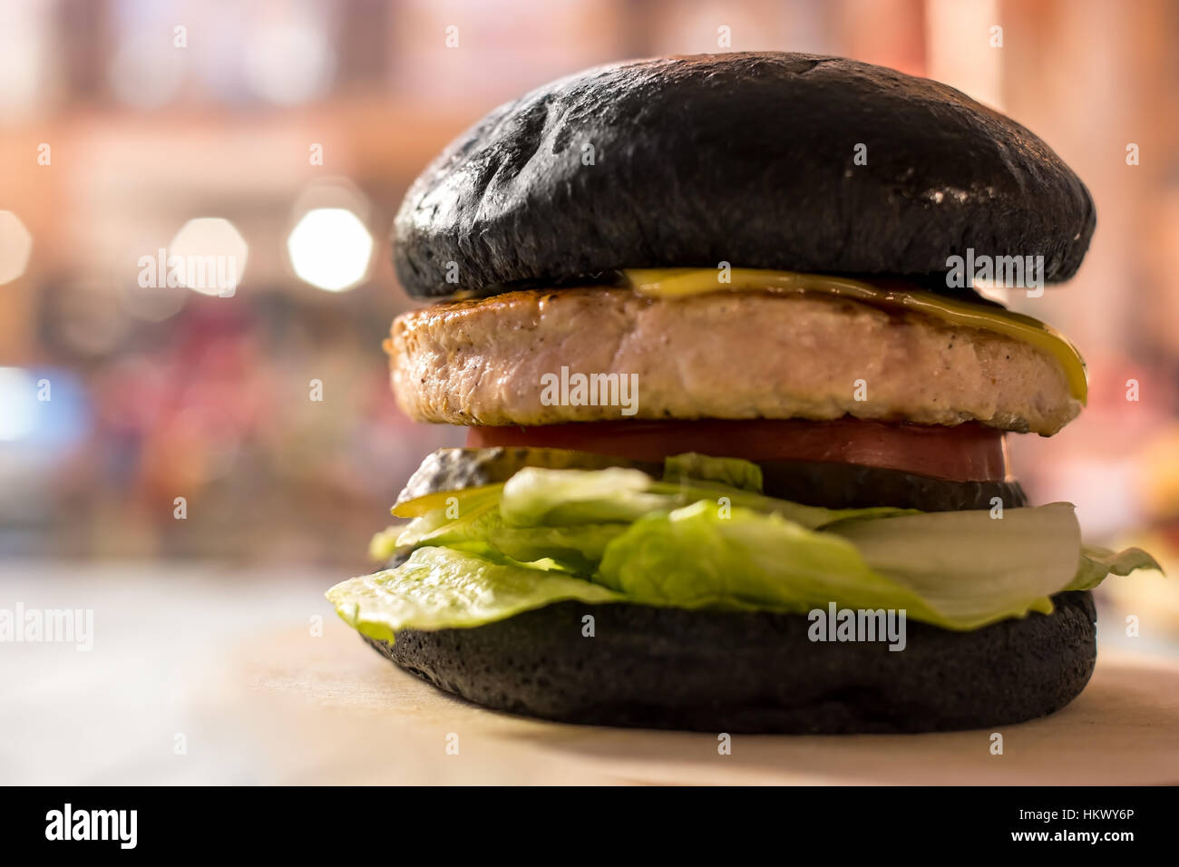 Burger with dark buns Stock Photo - Alamy