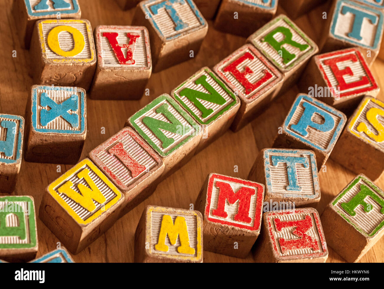 Vintage Wooden Childrens Blocks spell out the word Winner Stock Photo ...