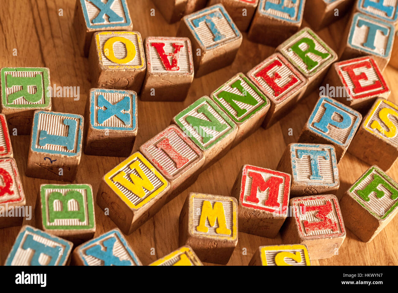 Vintage Wooden Childrens Blocks spell out the word Winner Stock Photo ...