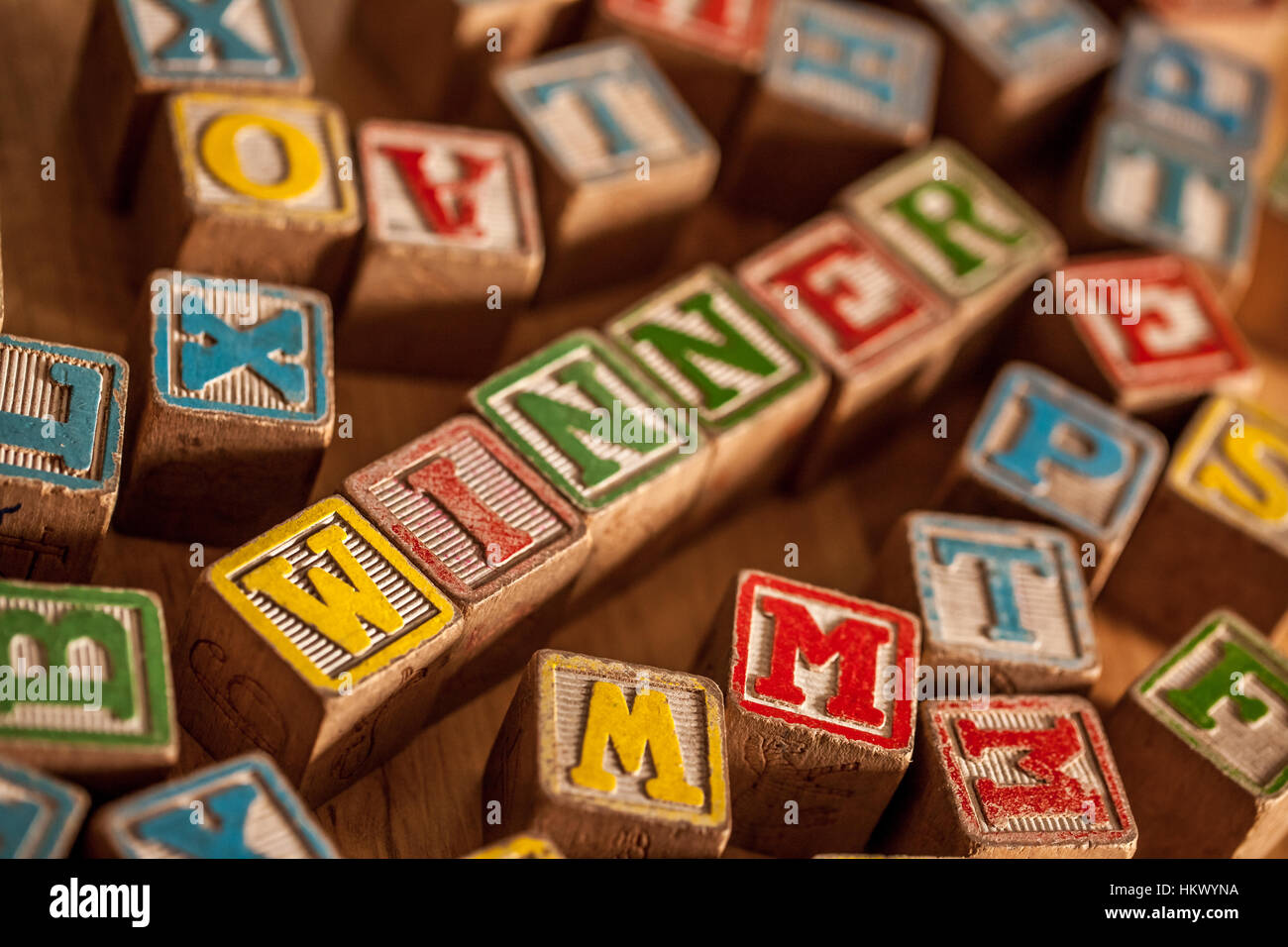 Vintage Wooden Childrens Blocks spell out the word Winner Stock Photo ...