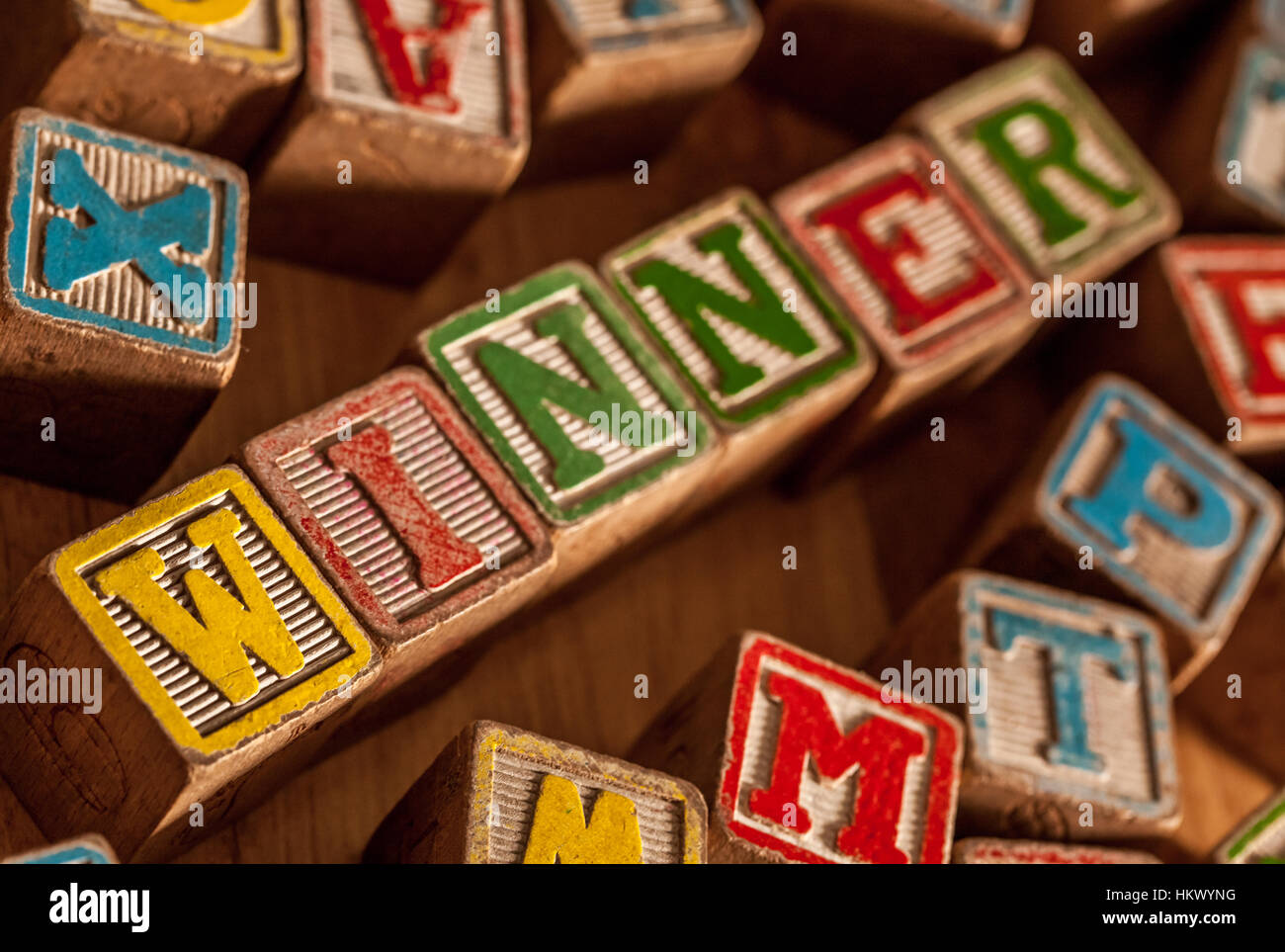 Vintage Wooden Childrens Blocks spell out the word Winner Stock Photo ...