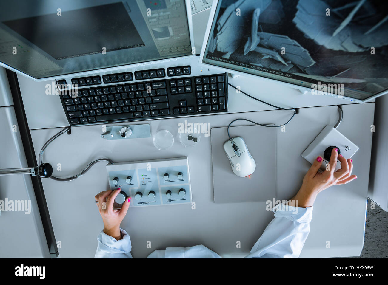 Portrait of a female chemistry student carrying out research in a ...