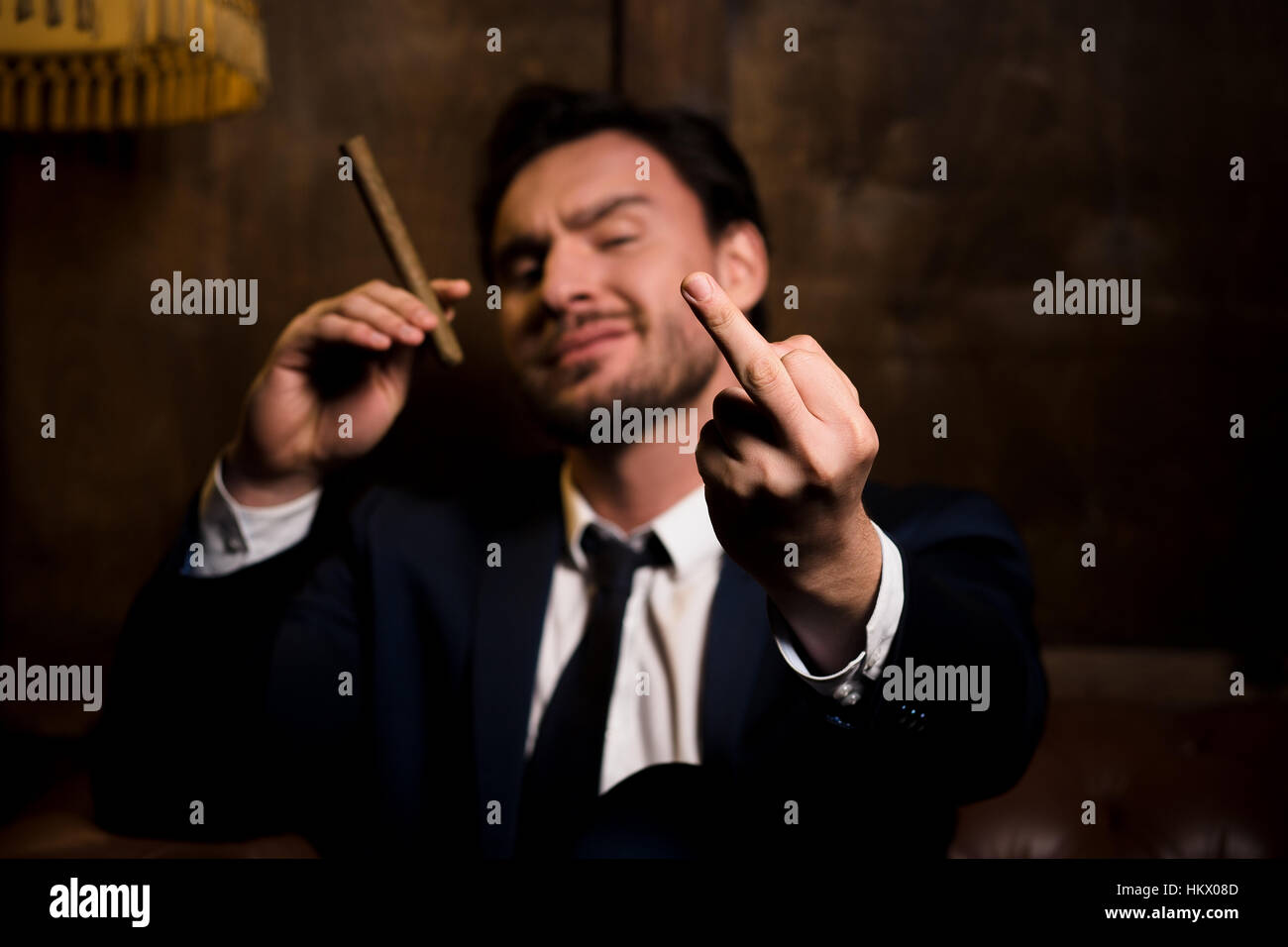 Rich businessman with cigar Stock Photo - Alamy