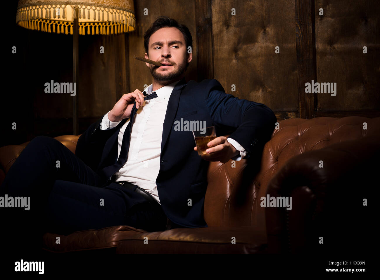 Rich businessman with cigar Stock Photo - Alamy