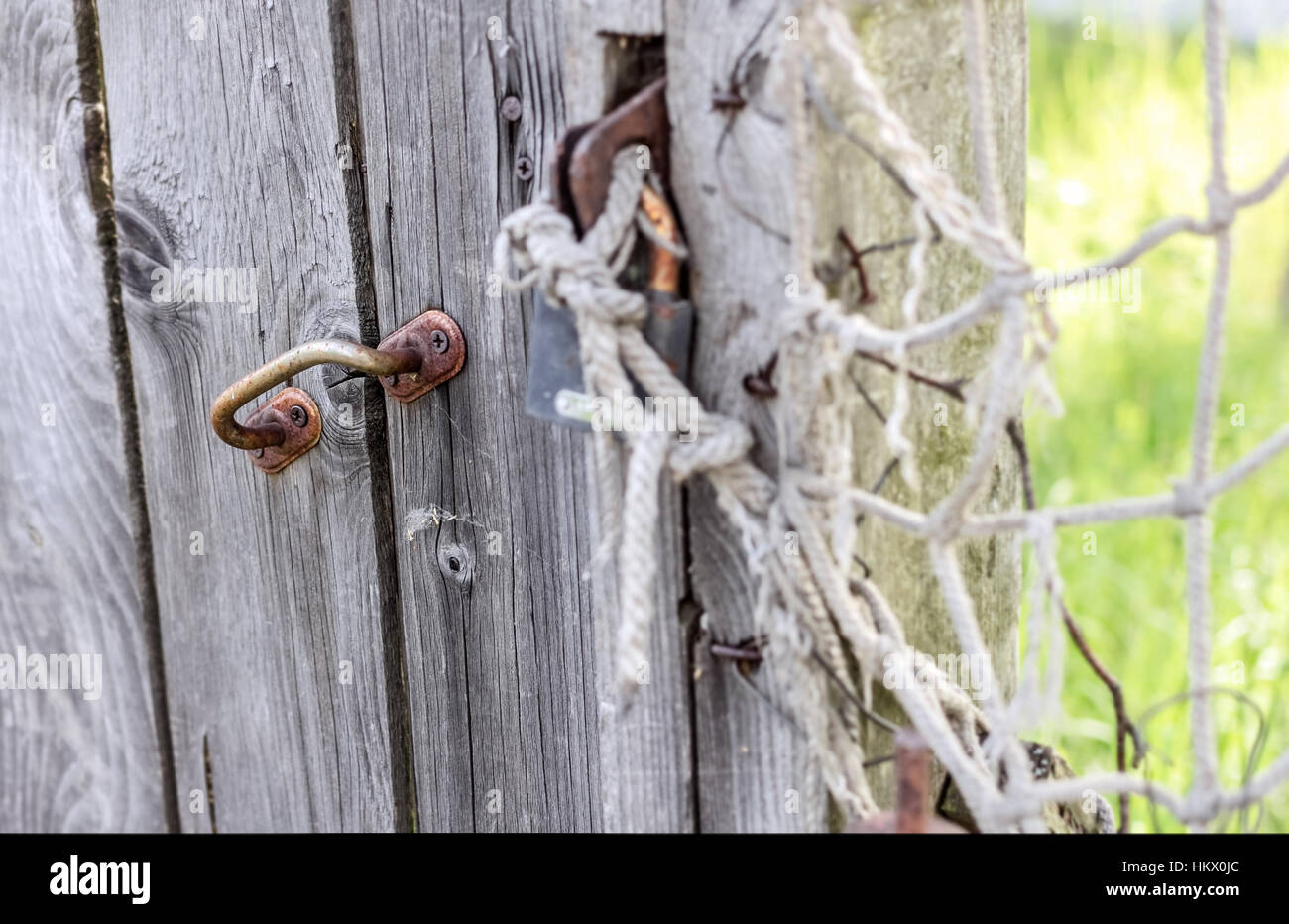 Iron fence lock hi-res stock photography and images - Alamy