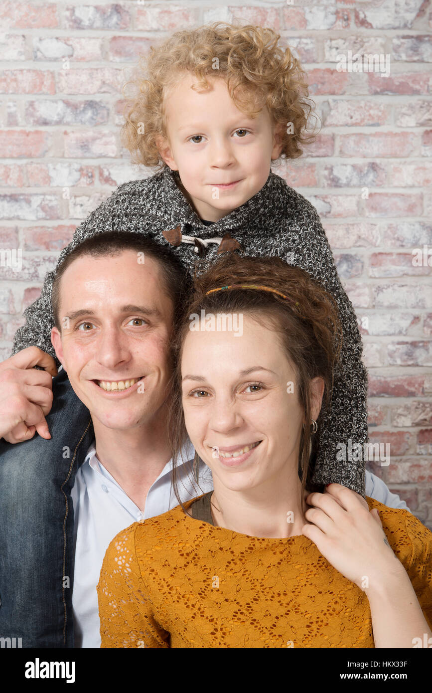 happy family, mother, father, child son at home Stock Photo - Alamy