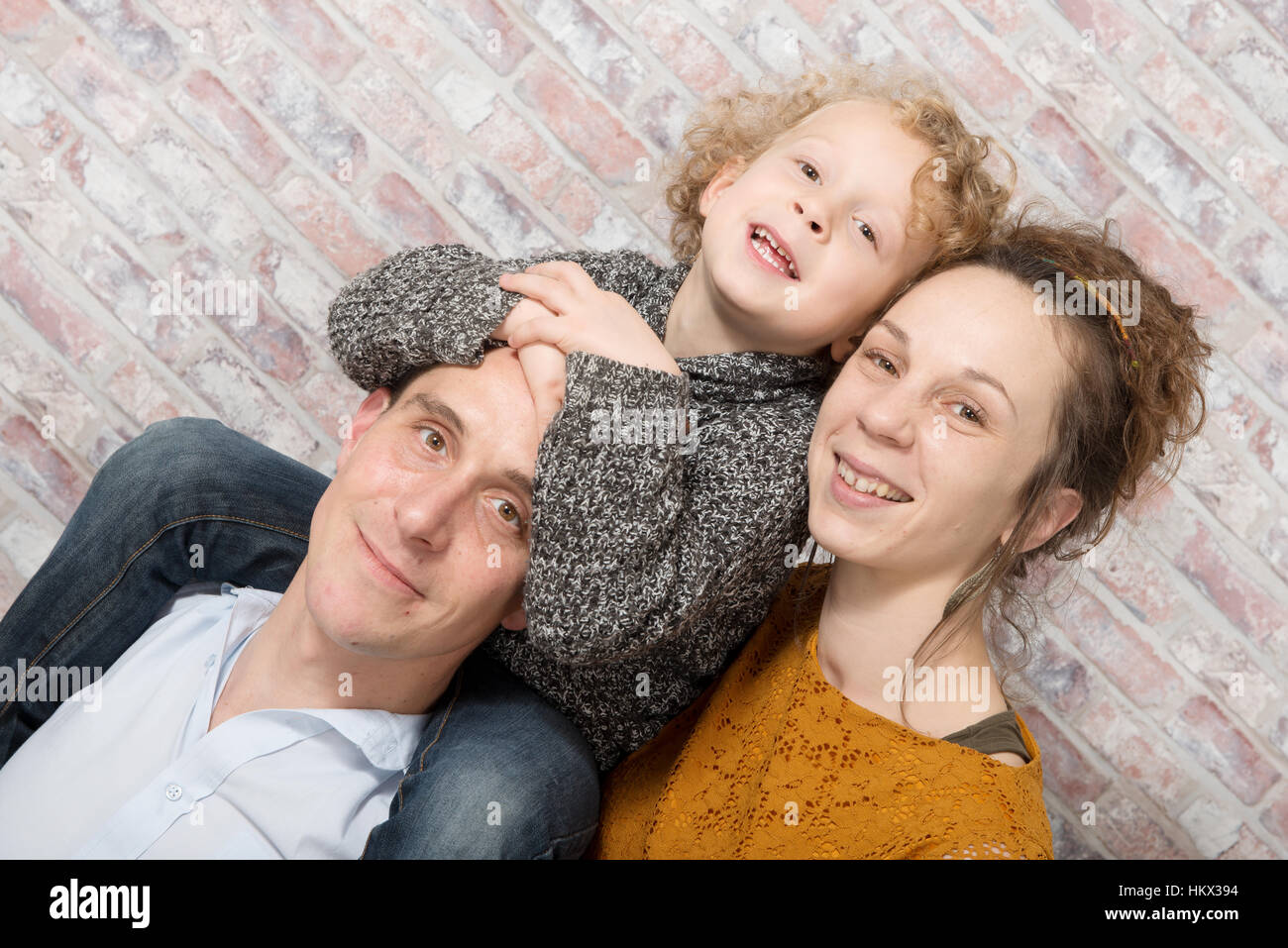 happy family, mother, father, child son at home Stock Photo - Alamy