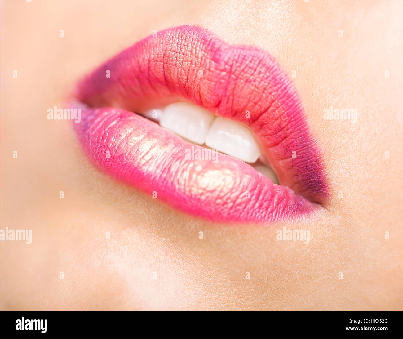 Close up portrait of a beautiful young model with bright make up. Close ...