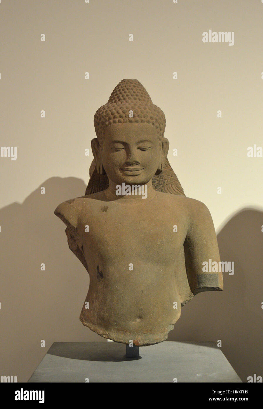 This artwork depicts the Buddha in the Naga-Bayon style, reflecting the ...