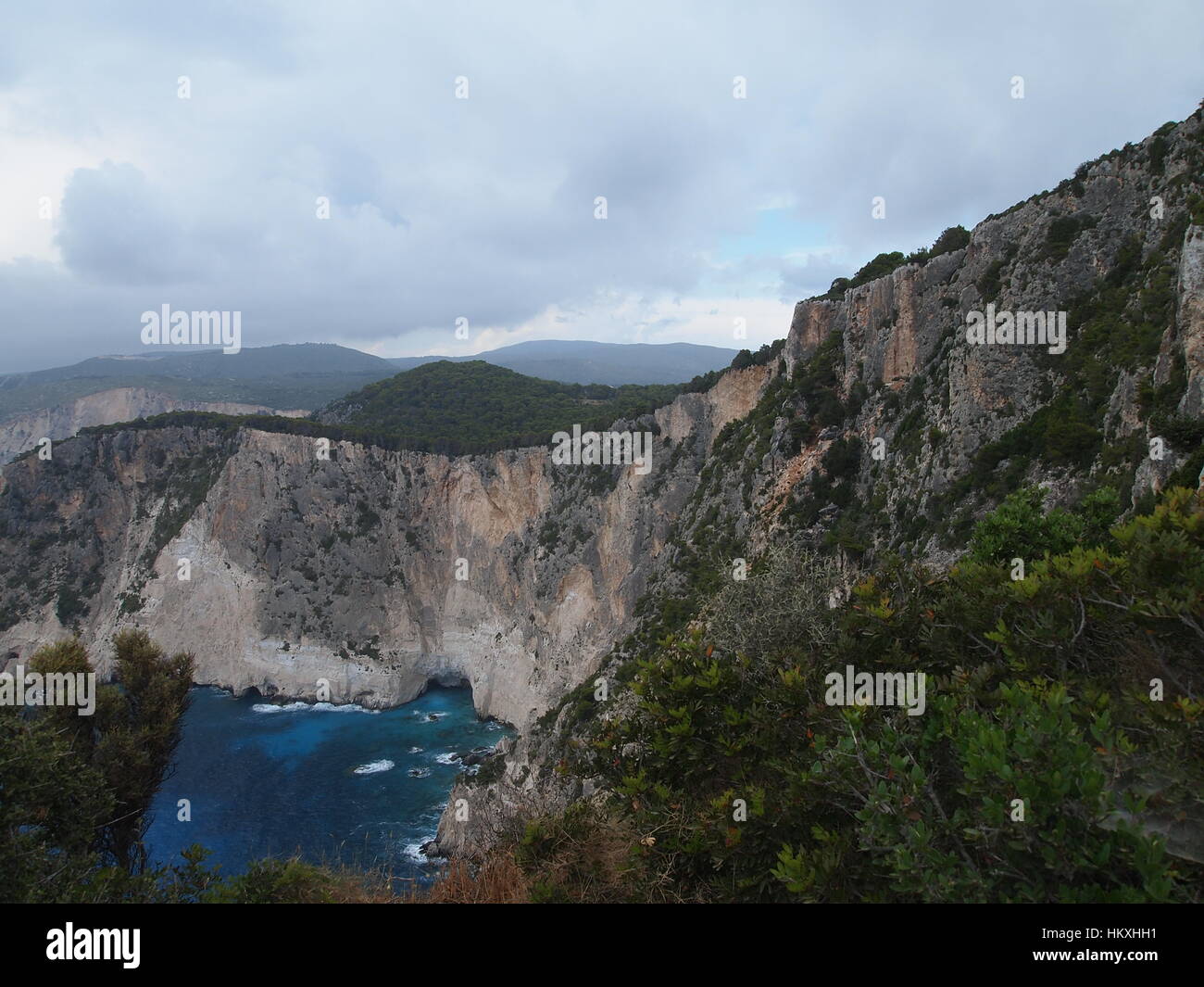 Very steep cliffs at Zakynthos island in Greece in cloudy summer day ...