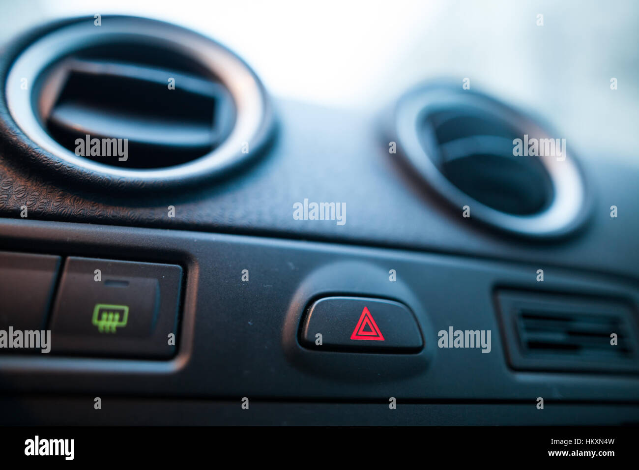 Color close up shot of a car's hazard button on dashboard Stock Photo ...