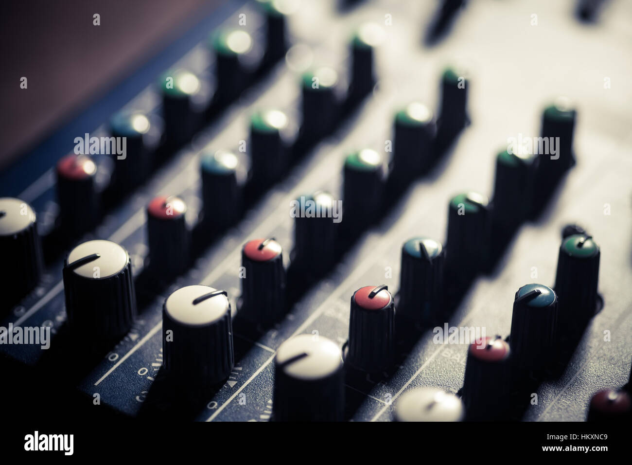Close up shot of a mixer desk with many buttons Stock Photo - Alamy