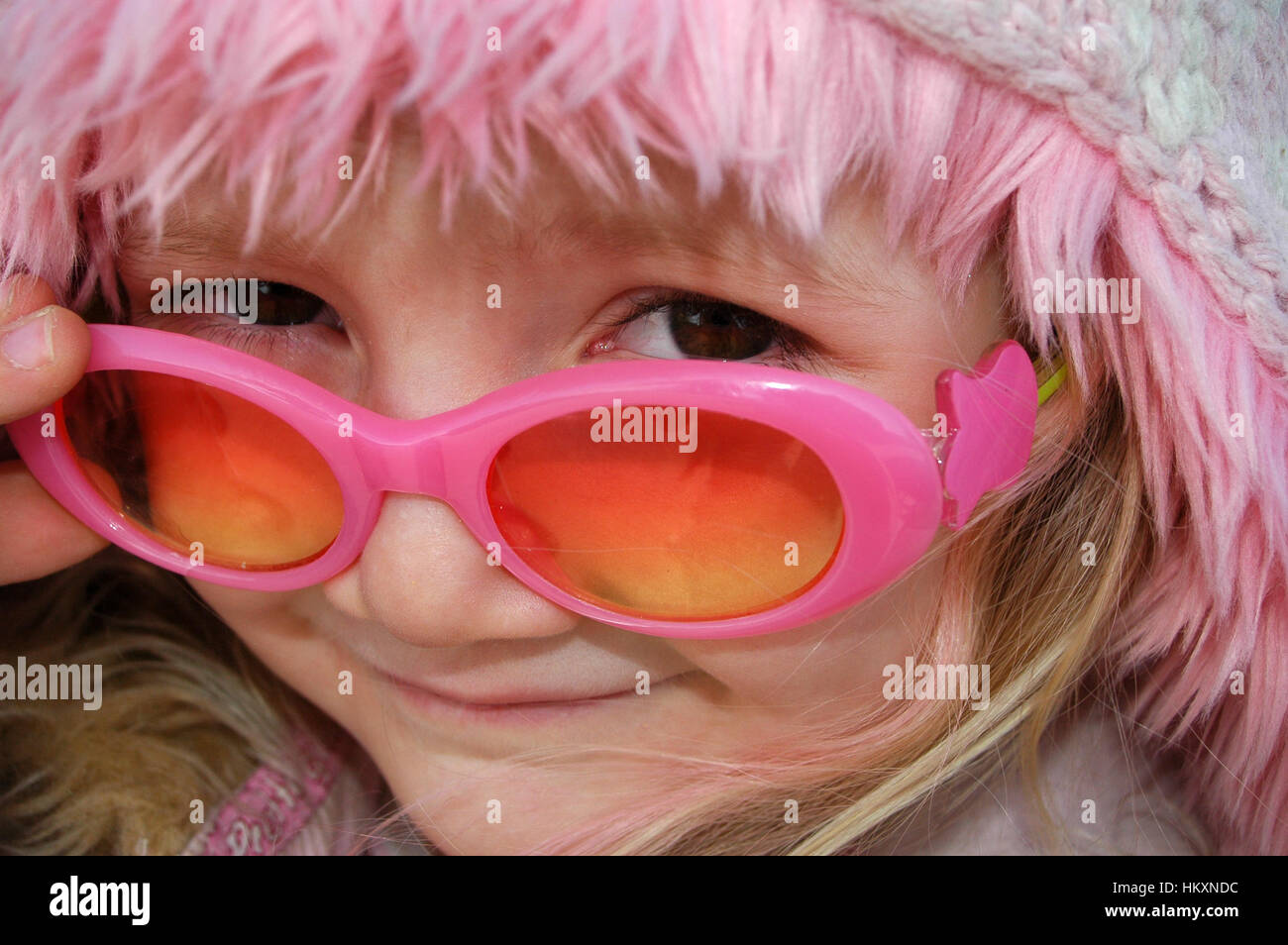 Little girl with pink sunglasses Stock Photo - Alamy