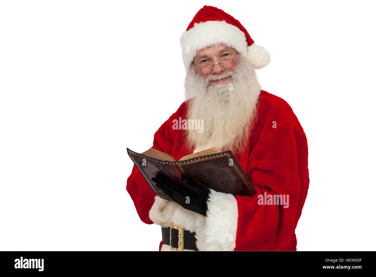 Santa Claus reading in a book (isolated Stock Photo - Alamy